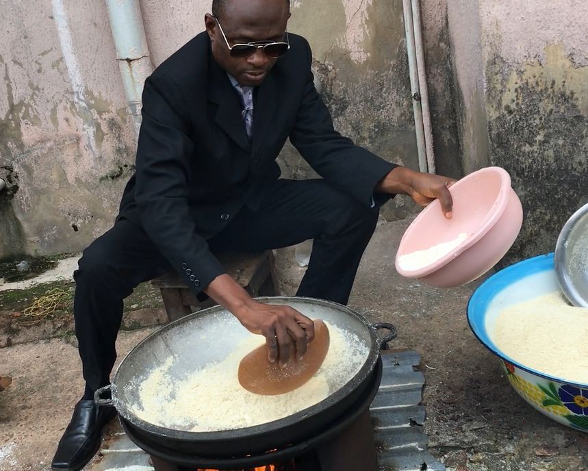 Man Fries Garri Wearing Suit to Protest High level of Unemployment in ...